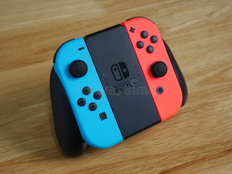 Nintendo Switch Controller Wooden Table Stock Photos - Free & Royalty ...