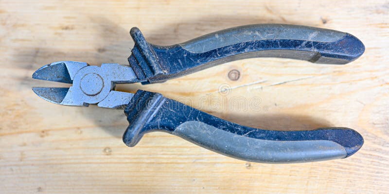 Nippers with Rubber Handle on Wooden Working Bench Stock Photo - Image ...