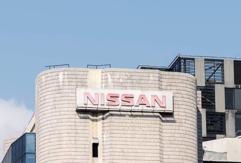 Nissan Trademark Logo on Building Editorial Image - Image of dealer ...