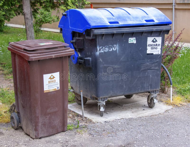 Garbage Sorting Bins in a Residential Area. Translation: Other Garbage ...