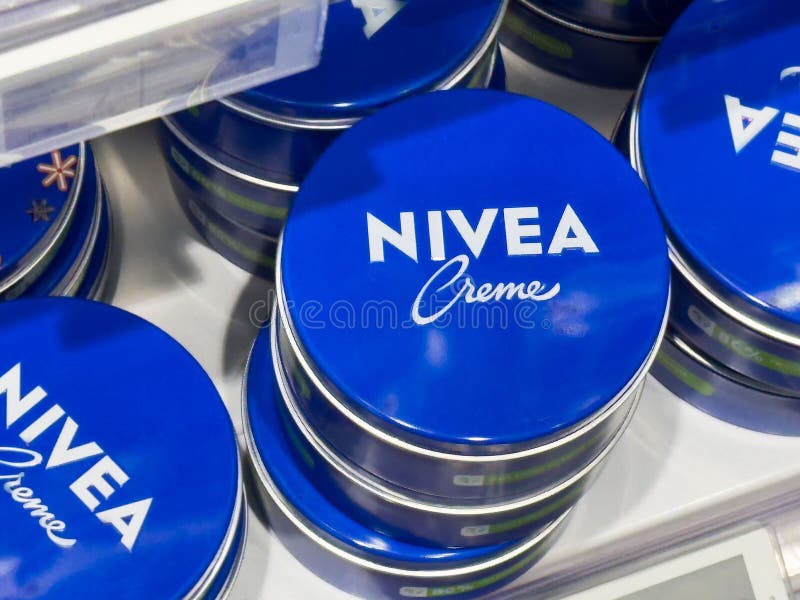Nivea Creme Blue Tins in Store Display Editorial Photography - Image of ...