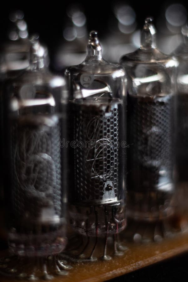 Nixie Tubes in-16 on a Printed Circuit Board with Electronic Components ...