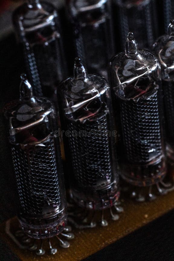 Nixie Tubes in-16 on a Printed Circuit Board with Electronic Components ...