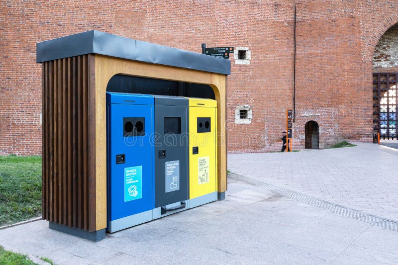Garbage Sorting Bins in a Residential Area. Translation: Other Garbage ...