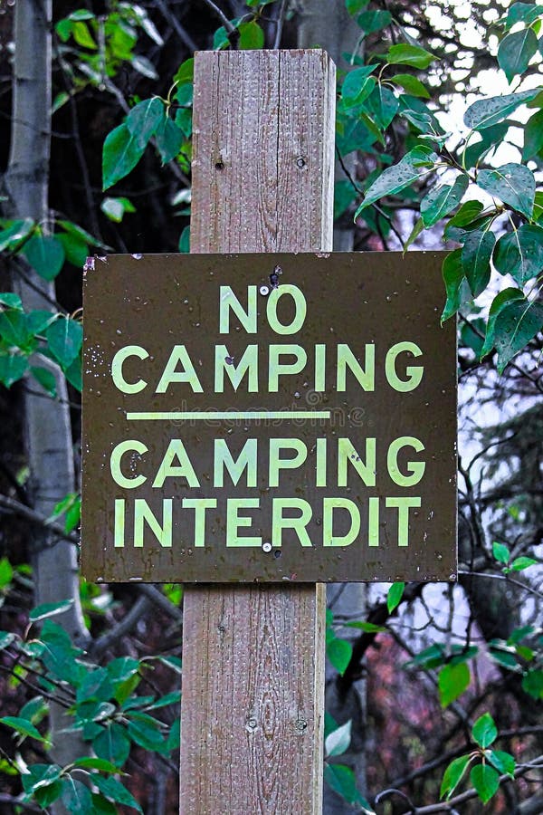 A No Camping or Overnight Parking Sign Stock Photo - Image of rules ...
