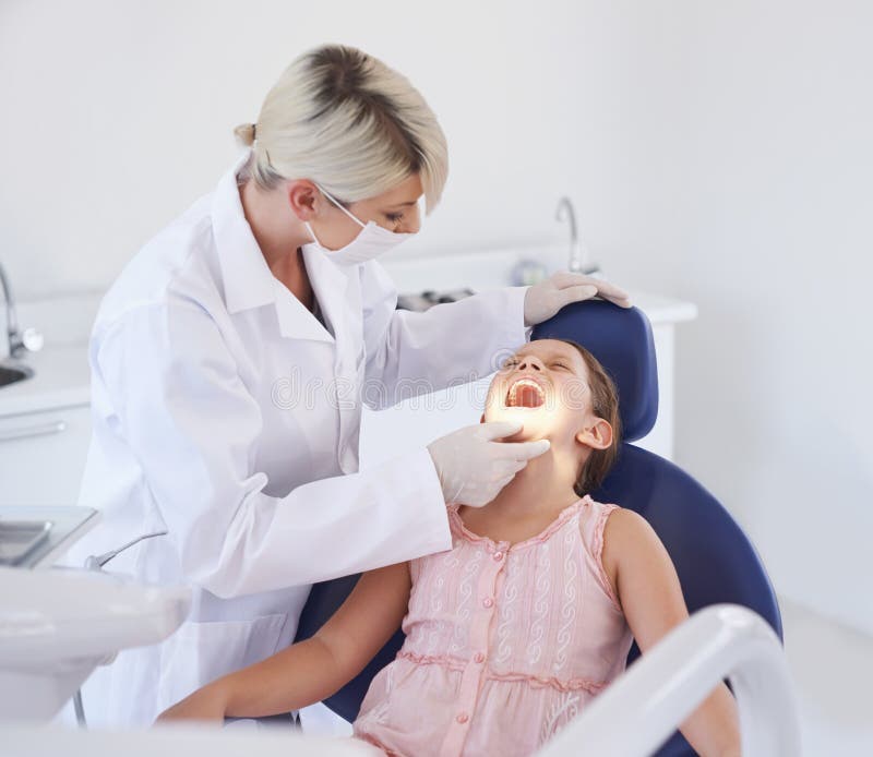 No Cavities Here. a Young Girl at the Dentist Getting a Checkup. Stock ...