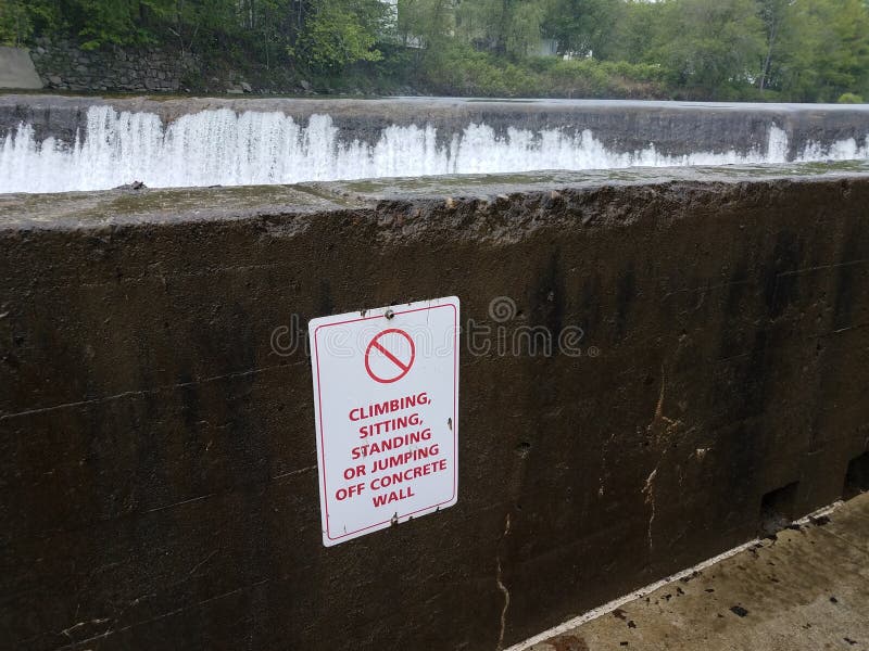 No Climbing Sitting or Standing or Jumping Off Wall Sign and Waterfall ...