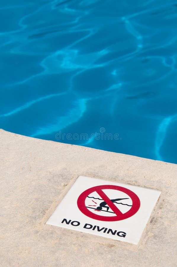 No Diving Sign on a Fence beside a Body of Water Stock Image - Image of ...