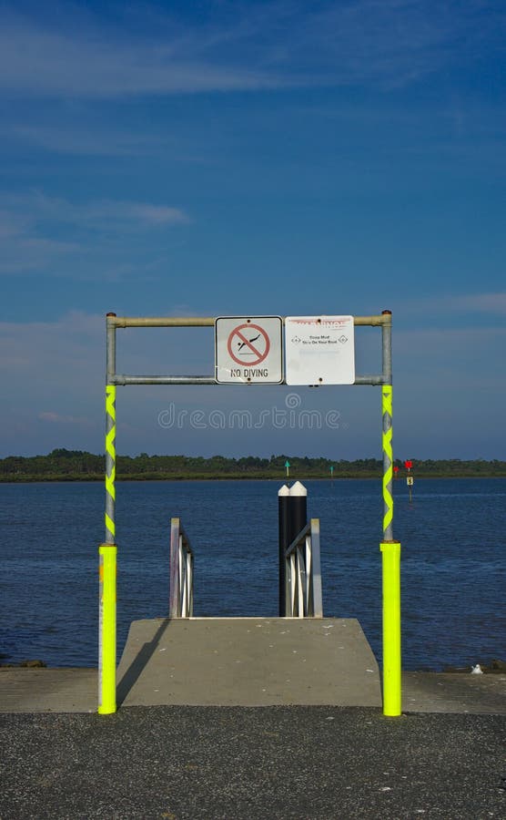 No Diving Sign on Pier stock photo. Image of summer - 140435526