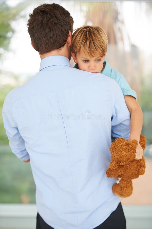 No, Dont Go. a Little Boy is Upset that His Father is Leaving for Work ...