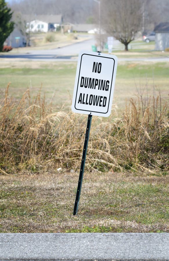 No Dumping Allowed Sign stock photo. Image of leaning - 240305442