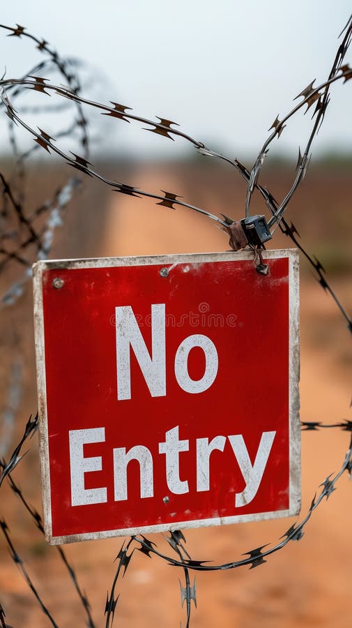 No Entry Sign on Barbed Wire Fence, Indicating Restricted Access Stock ...