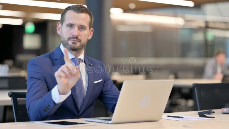 No Gesture with Finger by Middle Aged Businessman at Work Stock Photo ...