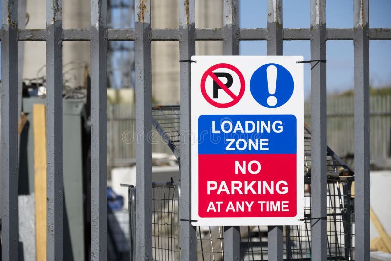 No Goods Vehicles Loading at Any Time Road Sign Stock Photo - Image of ...