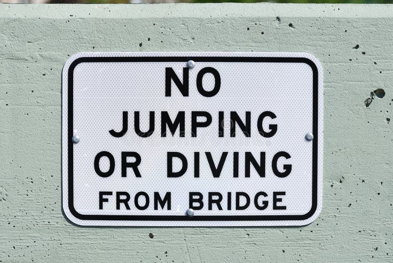 No Jumping or Diving Sign stock photo. Image of sign - 16226436