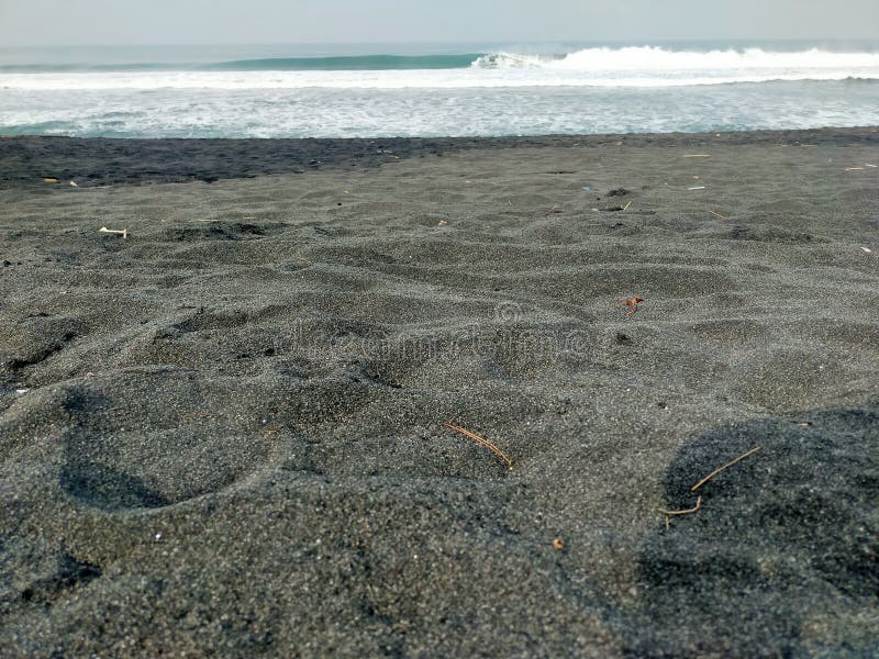 No Matter How Many Waves the Beach Sand Still Looks Solid Stock Image ...