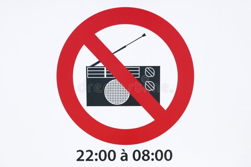 No Music Sign between 22.00 and 8:00 on a Wall Stock Image - Image of ...