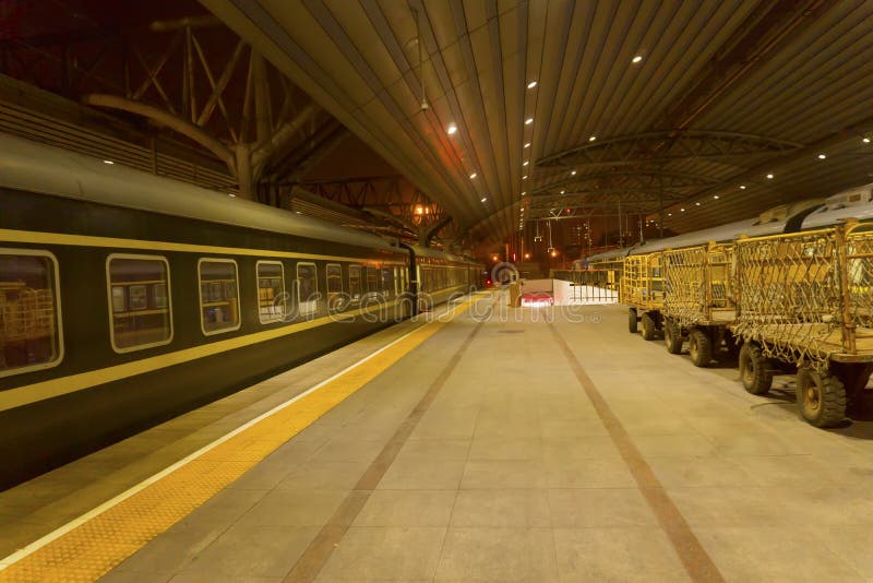 The Railway Platform and the Train at Night. Stock Photo - Image of ...