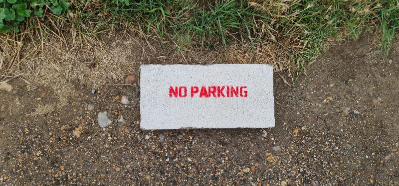 No Parking Sign Printed on a Stone Stock Photo - Image of memorial ...
