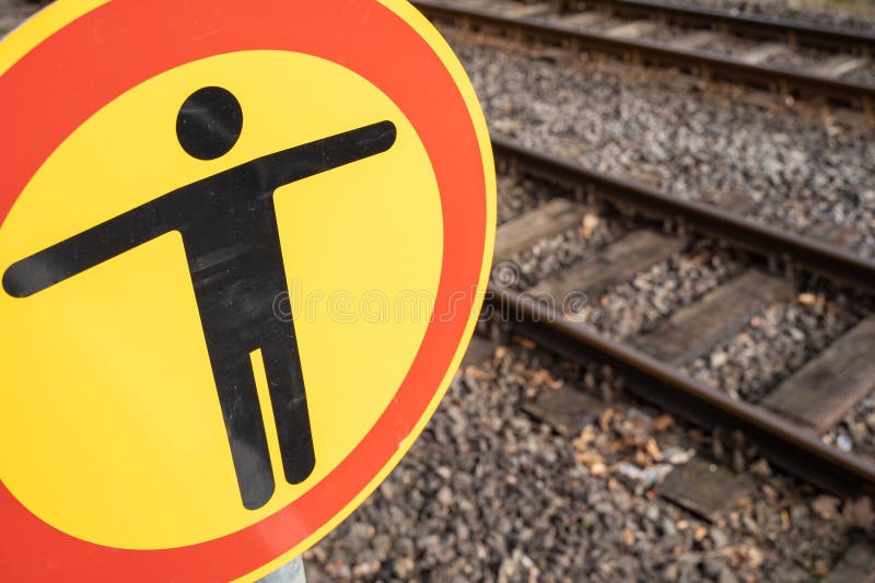 No Passage Sign on Train Platform with Rails in Background Stock Photo ...