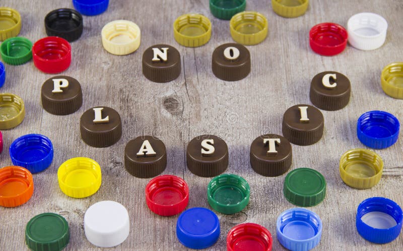 No Plastic. Inscriptions in Wooden Letters on Plastic Bottle Caps Stock ...