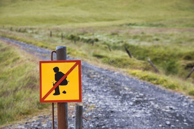 No Pooping Sign on a Metal Post Outdoors Stock Photo - Image of road ...