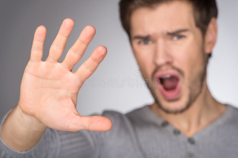 No! Portrait of Young Men Shouting and Gesturing while Standing Stock ...