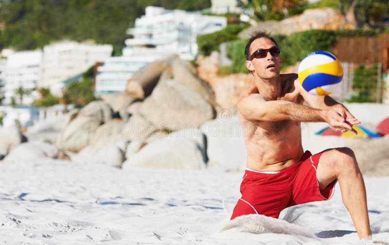 No Quarter Given. a Beach Volleyball Game on a Sunny Day. Stock Image ...