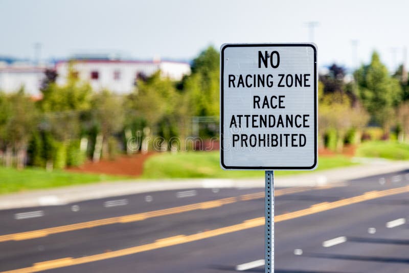 No Racing Zone Sign on a Post Stock Photo - Image of symbol, travel ...