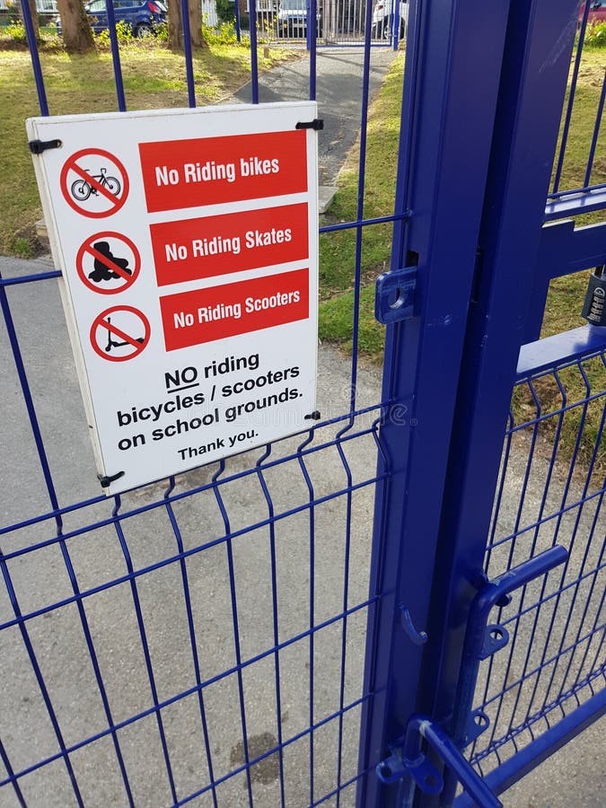 No Riding, Skates or Scooters on School Grounds Sign. Stock Photo ...