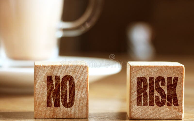 No Risk Words on Wooden Blocks and Cacao Cup. Risk Management Concept ...