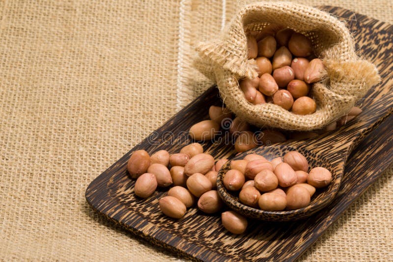 No Shell Dry Peanut in Wooden Spoon and Sack Stock Image - Image of ...