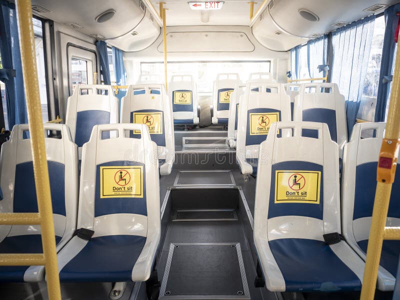 No Sitting Sign on Bus Seat. No People on Bus. Empty Seat. Flare Light ...