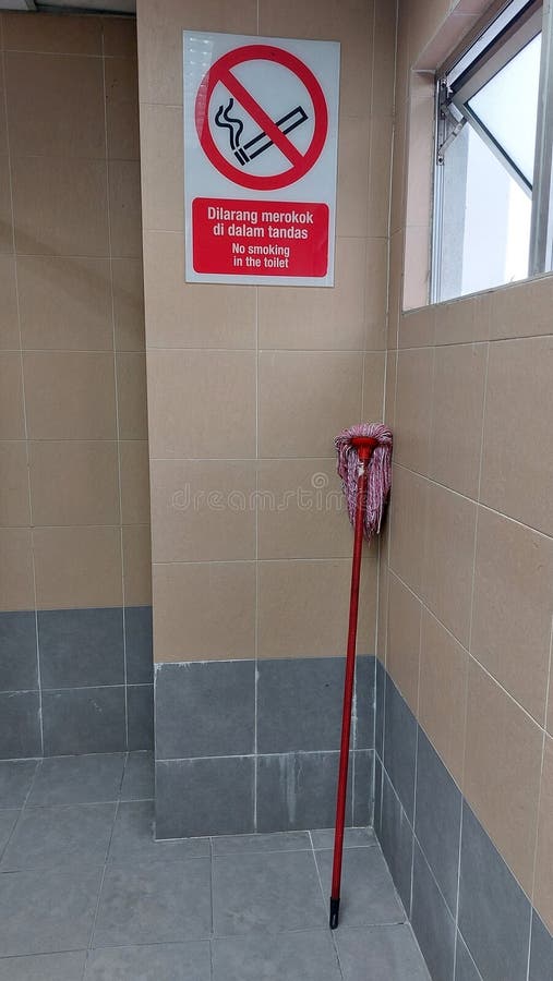 No Smoking Sign with Mop at the Toilet Stock Image - Image of sign ...