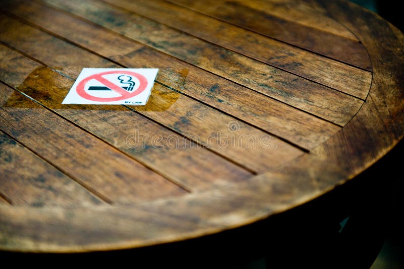No smoking sign on table stock image. Image of heart - 10202139