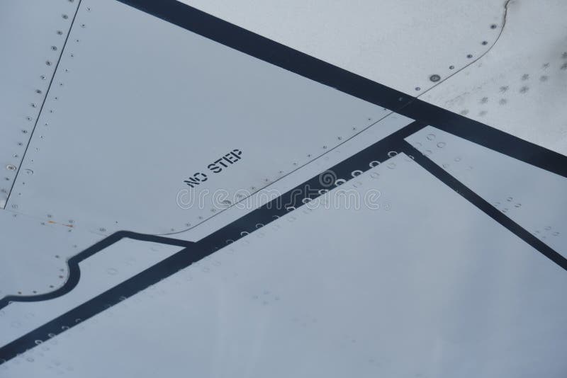 No Step Sign on the Commercial Airplane Wing Stock Photo - Image of ...