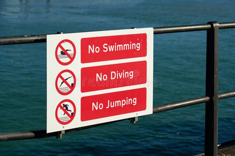 No Swimming, No Diving, and No Jumping Sign. Stock Photo - Image of ...