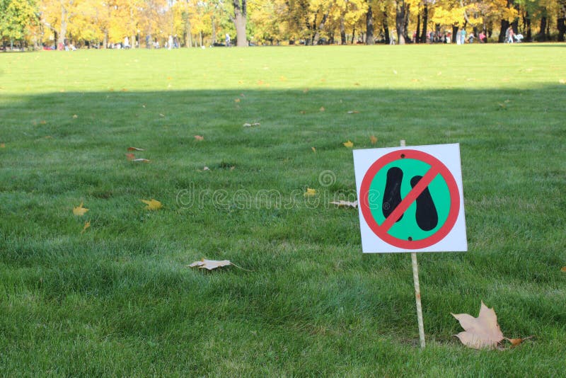 No Walking Sign on a Green Meadow Stock Photo - Image of forbidden ...
