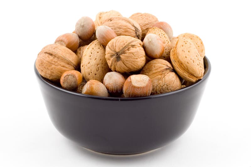 Noix, noisettes et amandes image stock. Image du personne - 22995331