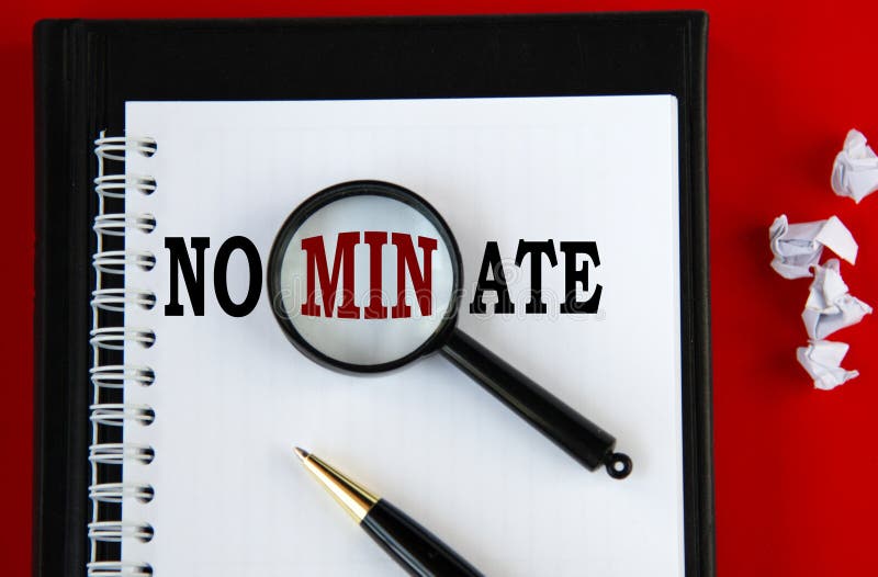 NOMINATE - Word in White Notebook on Red Background Stock Photo - Image ...