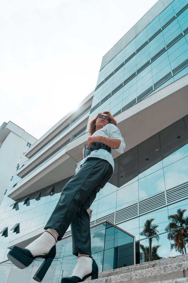 Non-binary Executive Young of LGBTQ Community Walking on Stairs Front ...