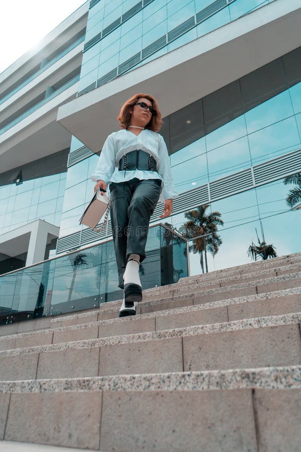 Non-binary Executive Young of LGBTQ Community Walking on Stairs Front ...