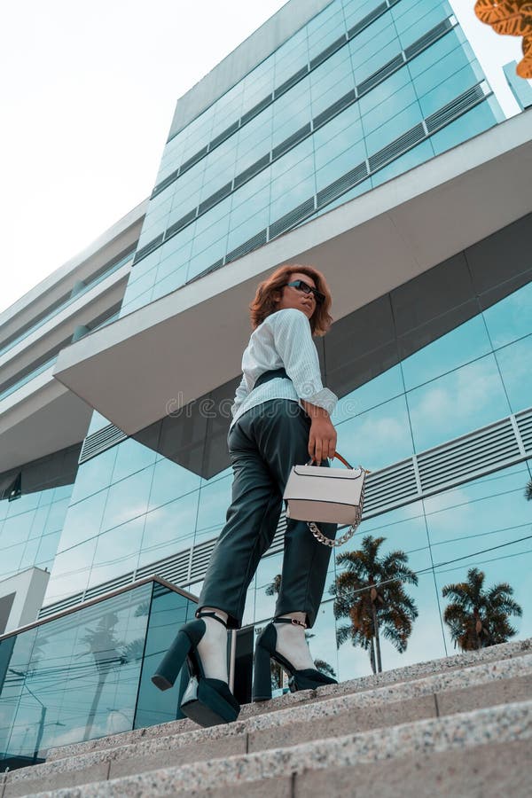 Non-binary Executive Young of LGBTQ Community Walking on Stairs Front ...