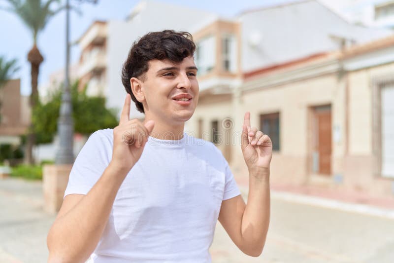 Non Binary Man Smiling Confident Speaking at Park Stock Photo - Image ...
