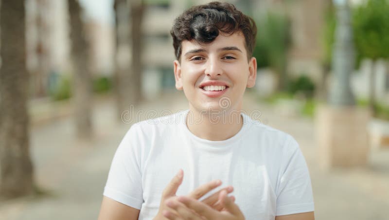 Non Binary Man Smiling Confident Speaking at Park Stock Photo - Image ...