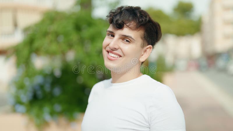 Non Binary Man Smiling Confident Standing at Park Stock Photo - Image ...