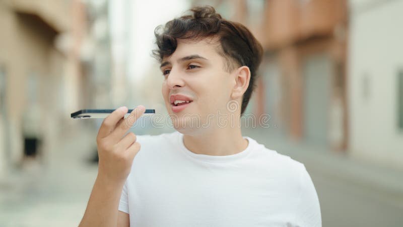 Non Binary Man Smiling Confident Talking on Smartphone at Street Stock ...