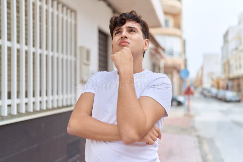 Non Binary Man Standing with Doubt Expression at Street Stock Image ...