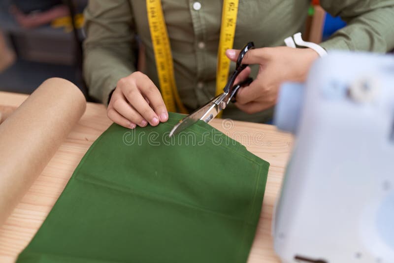 Non Binary Man Tailor Smiling Confident Cutting Cloth at Atelier Stock ...