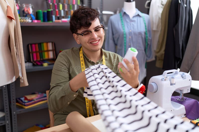 Non Binary Man Tailor Smiling Confident Holding Cloth and Thread at ...